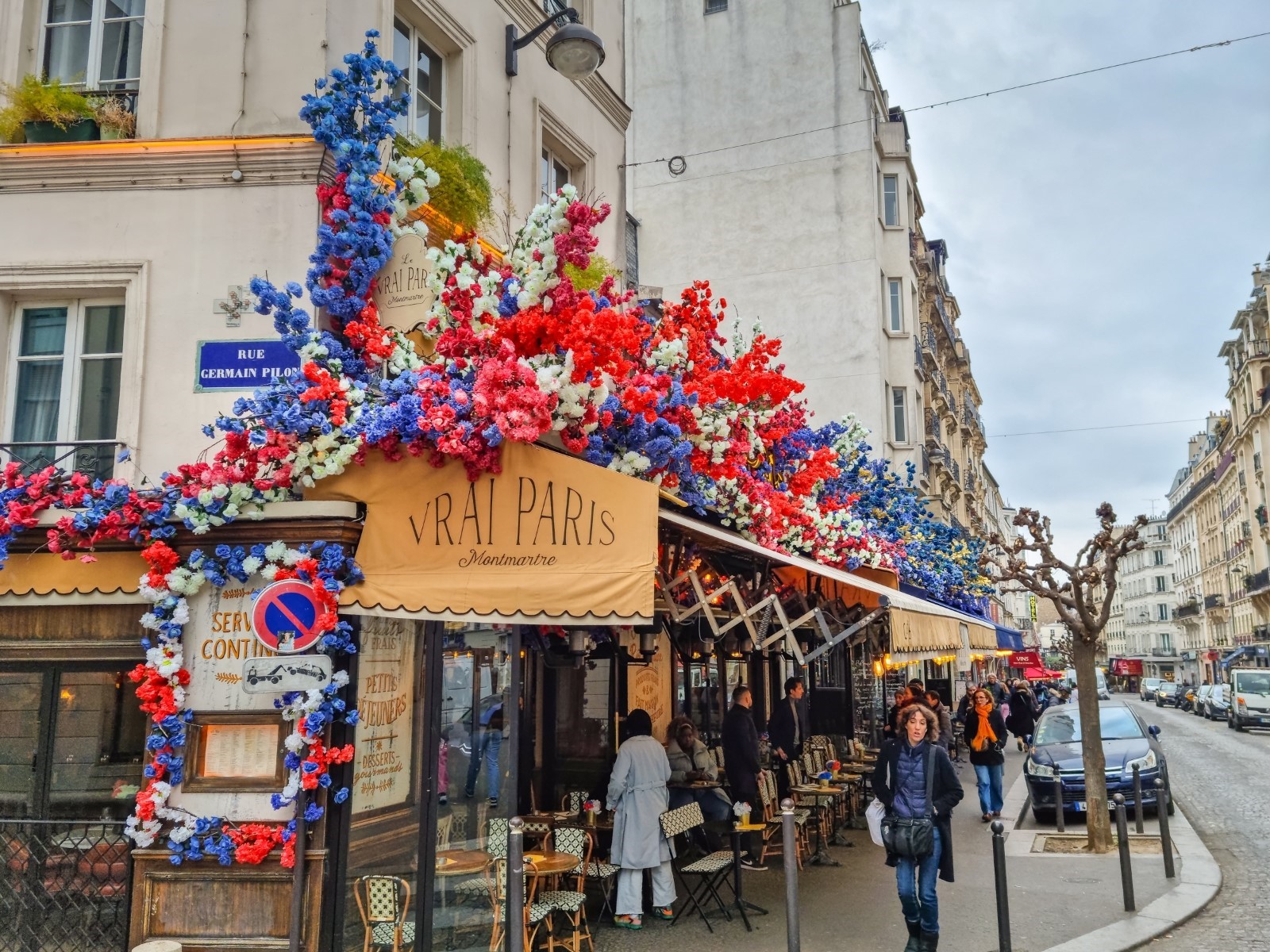 Le Vrai Paris: A Classic Bistro with a Floral Terrace on Rue des Abbesses | Taste of France®