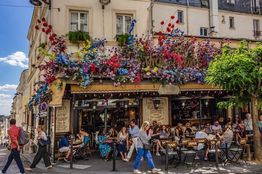 Le Vrai Paris: A Classic Bistro with a Floral Terrace on Rue des Abbesses | Taste of France®